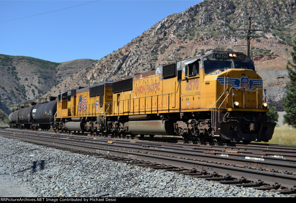 UP 4570 3996 (both SD70M) lead the eastbound Evanston local at Croydon, Utah. August 29, 2023